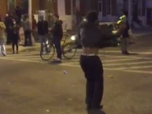 That moment a guy danced to Michael Jackson's 'Beat It' during riots ...