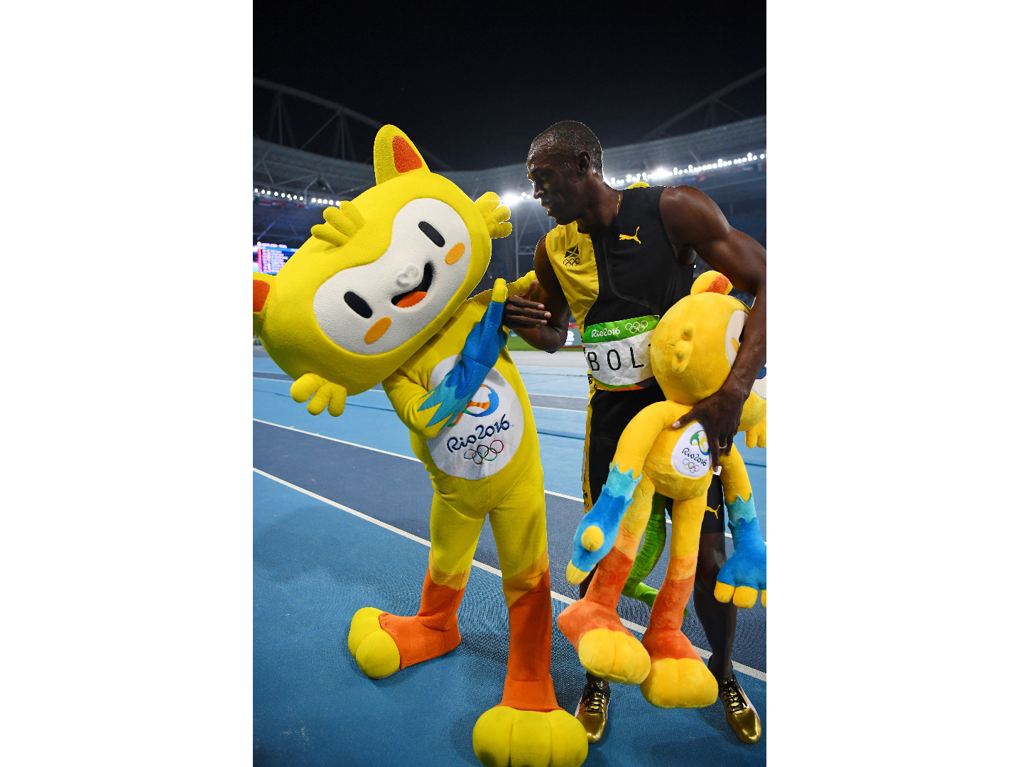Fastest man alive Usain Bolt has a soft spot for mascots | wcnc.com